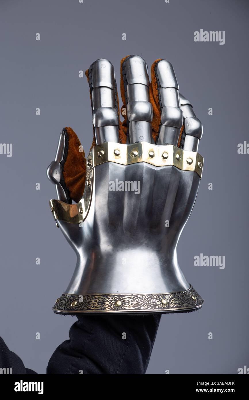 Silver Hourglass Gauntlets with Brass Details. This image shows a close ...