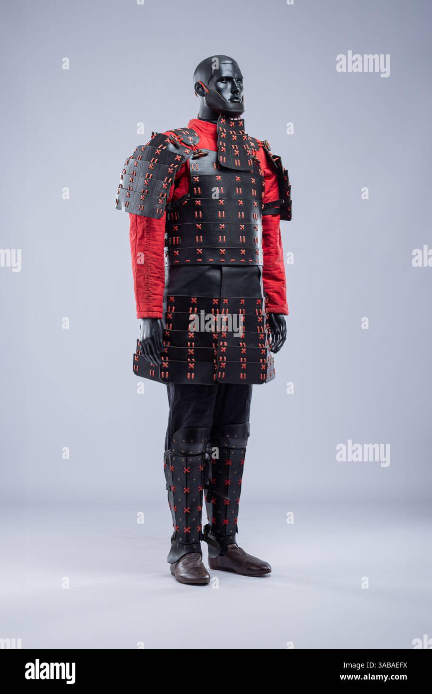 Full Black and Red Leather Armor Set on Mannequin. Warrior costume with ...