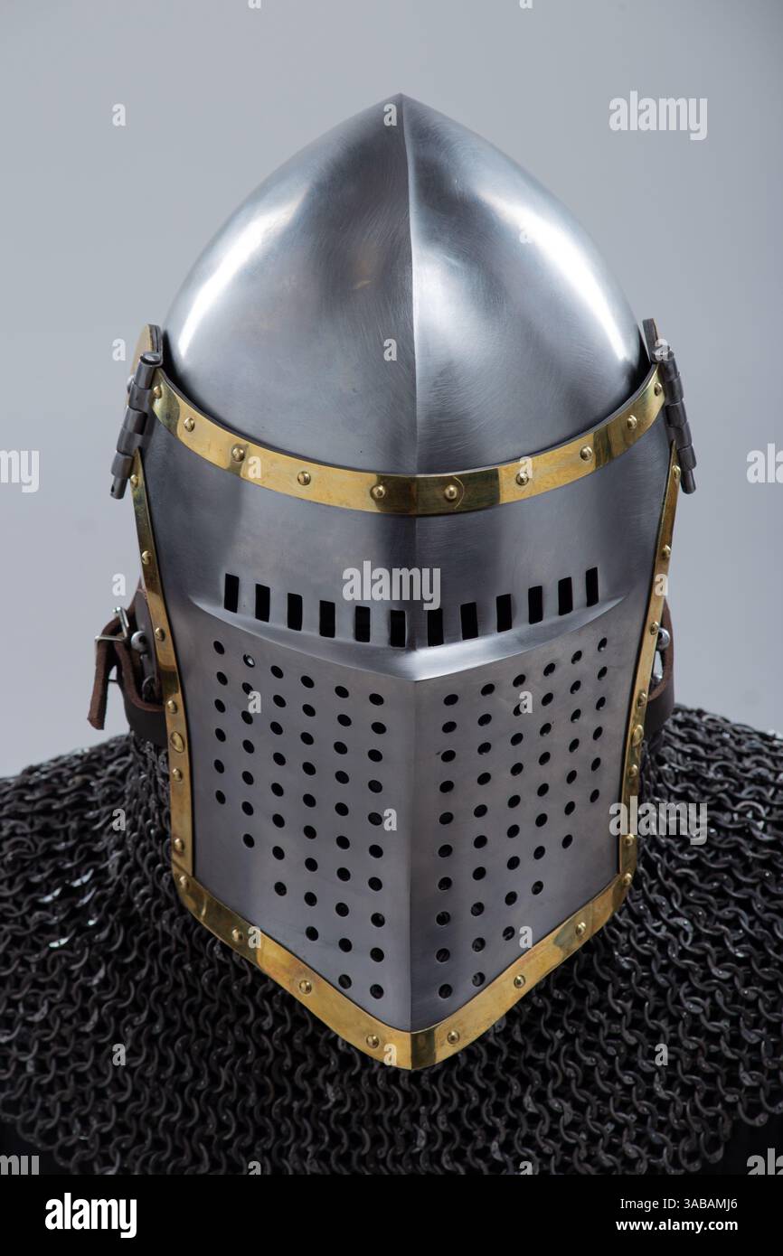 Steel Helmet with Perforated Visor. Medieval head protection featuring ...