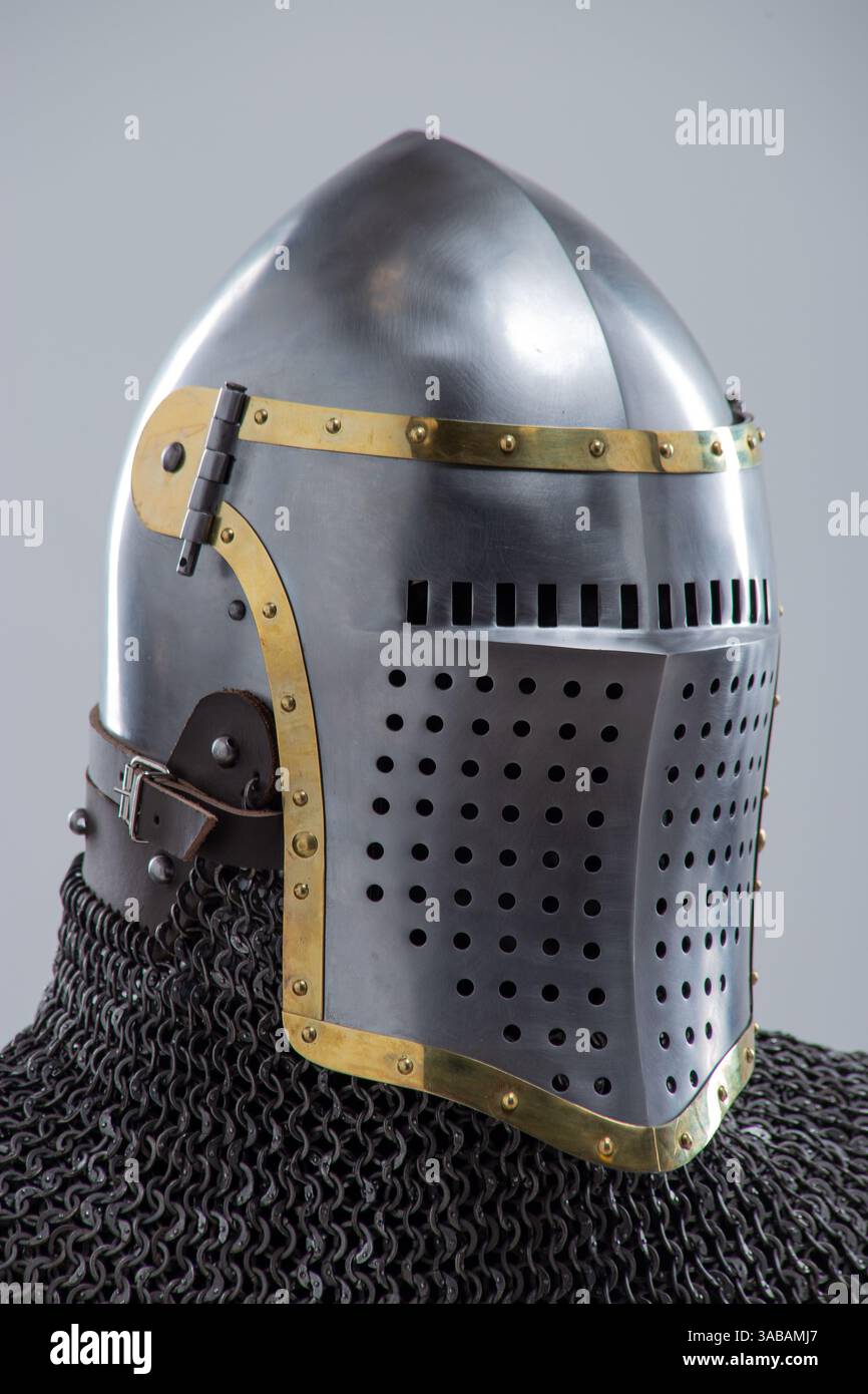Steel Helmet with Perforated Visor. Medieval head protection featuring ...