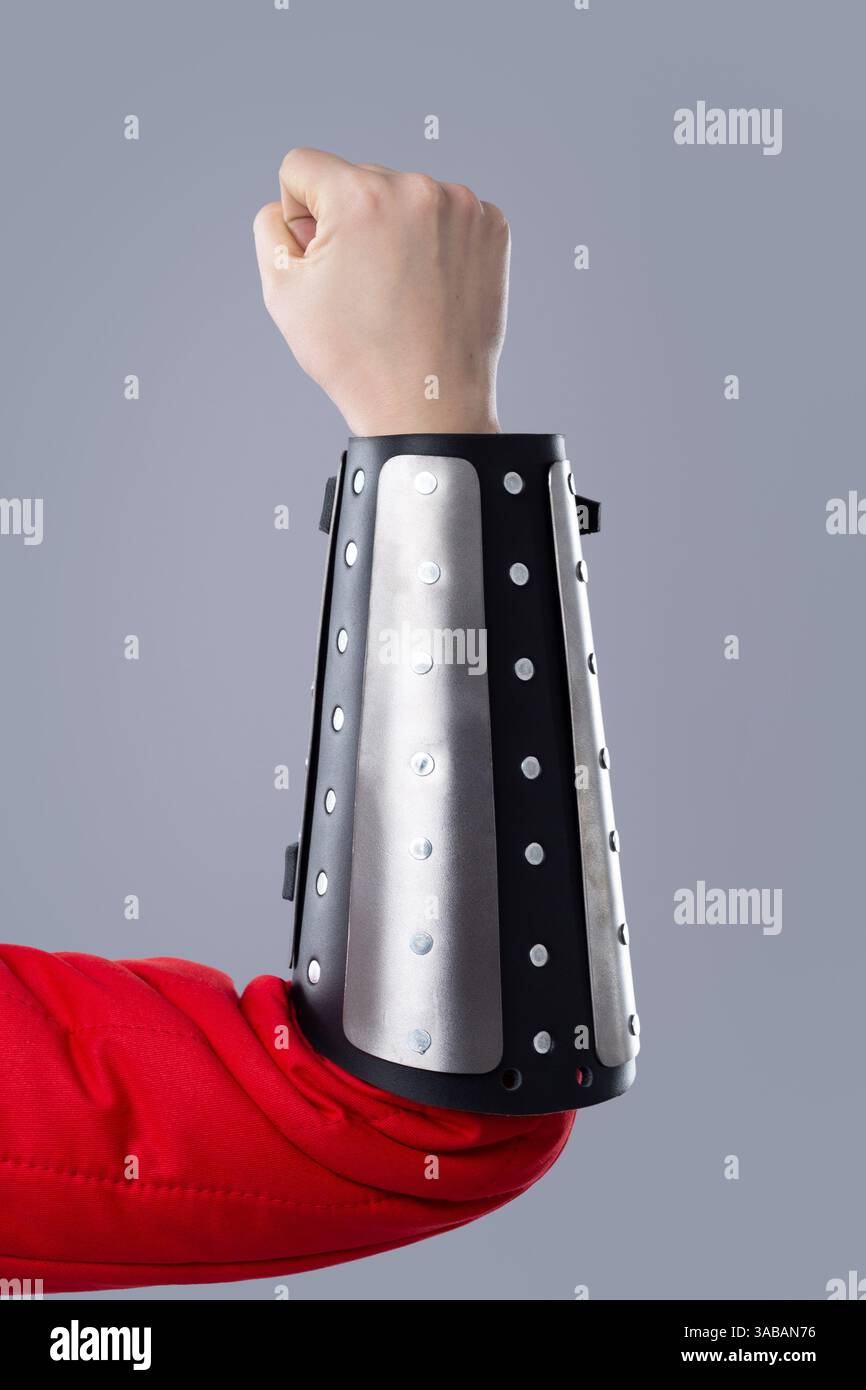 Silver Splinted Bracer on an Arm. This image shows a silver metal ...