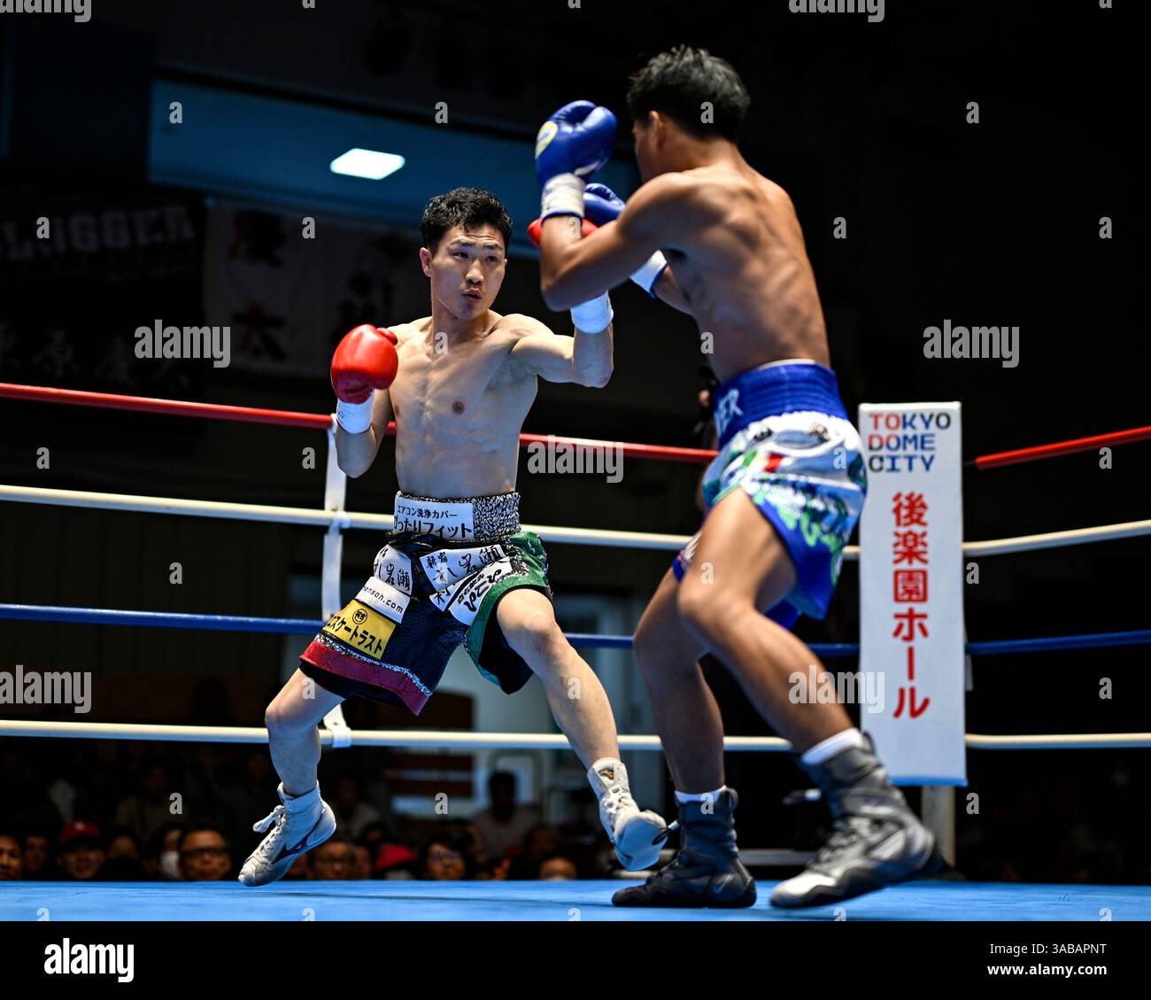 Tokyo, Japan. 24th Mar, 2025. Champion Japan's Keita Kurihara (red ...
