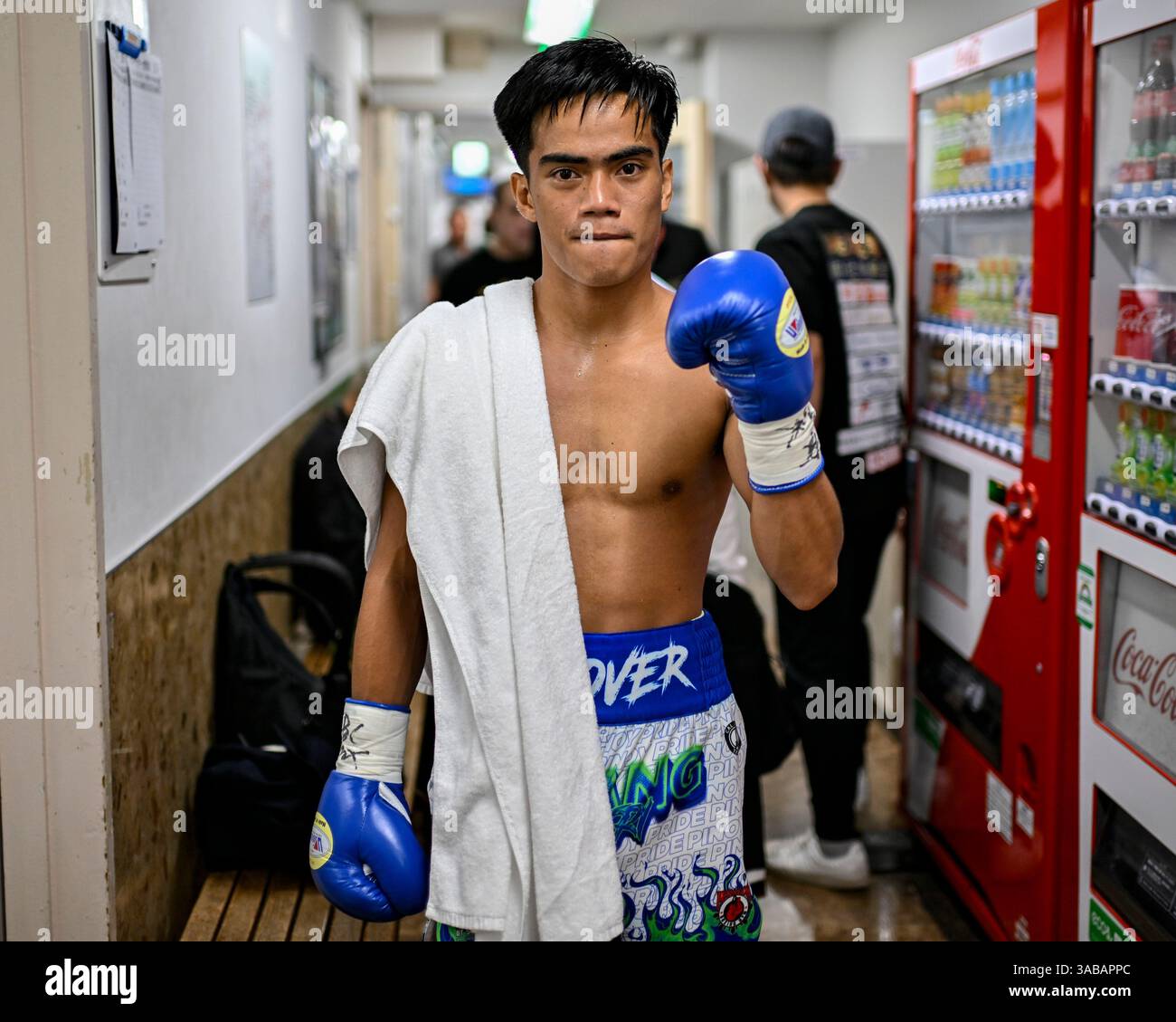 Philippines' Kenneth Llover poses after winning the OPBF Bantamweight ...