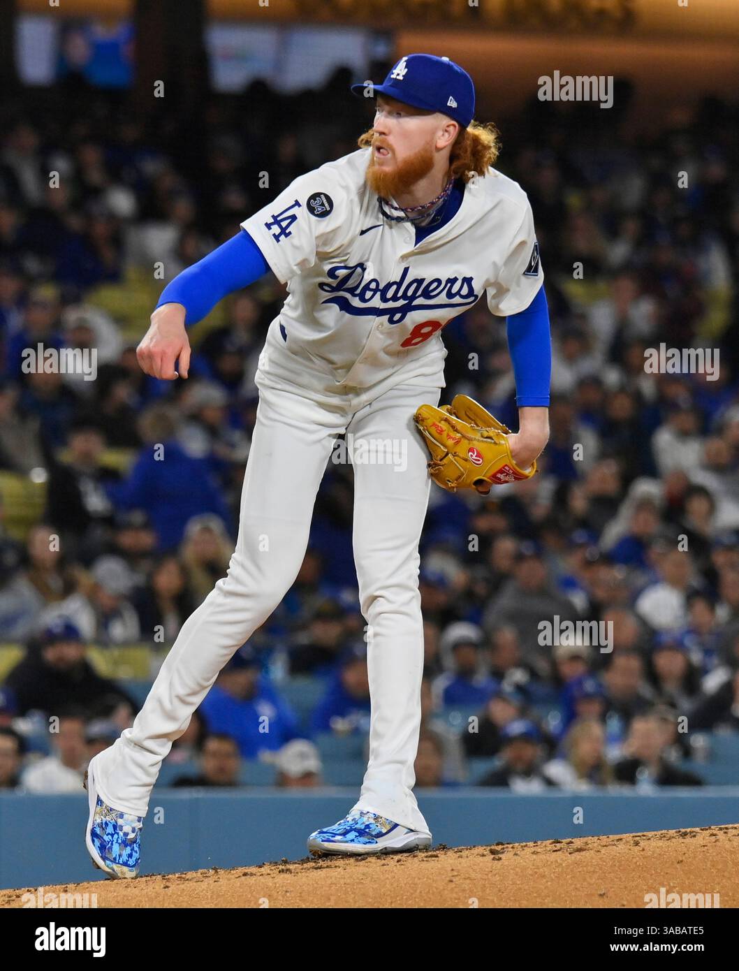 Los Angeles Dodgers starting pitcher Dustin May delivers in the third ...