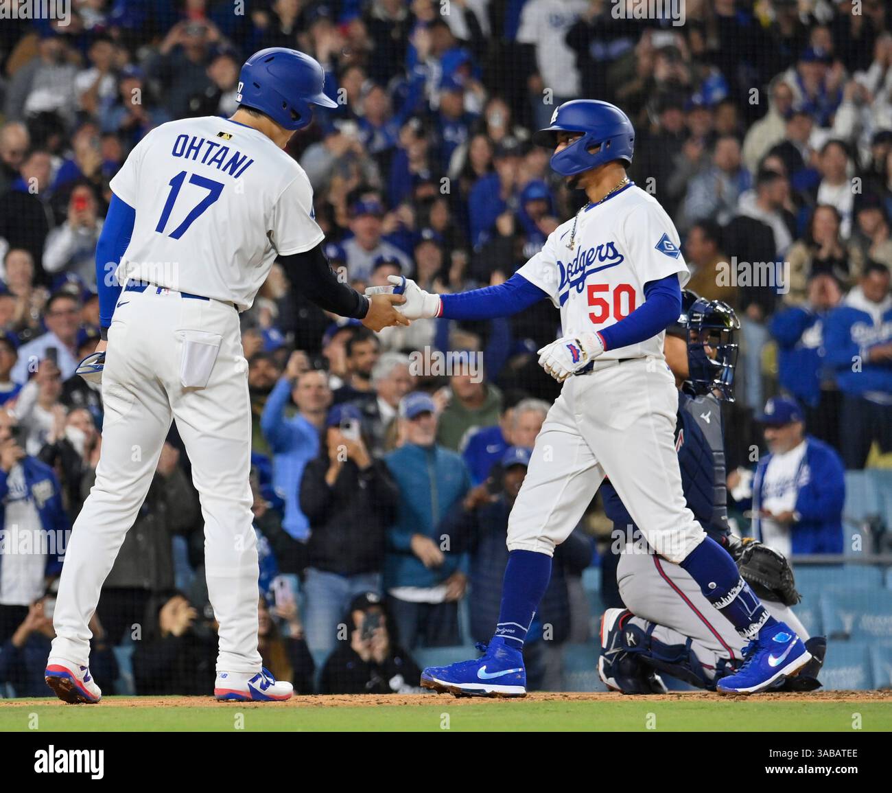 Los Angeles Dodgers shortstop Mookie Betts (50) celebrates with Shohei ...