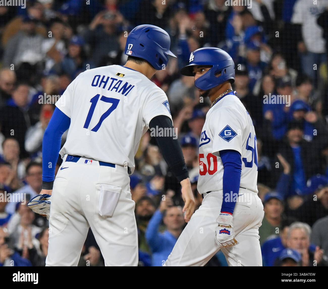 Los Angeles Dodgers shortstop Mookie Betts (50) celebrates with Shohei ...