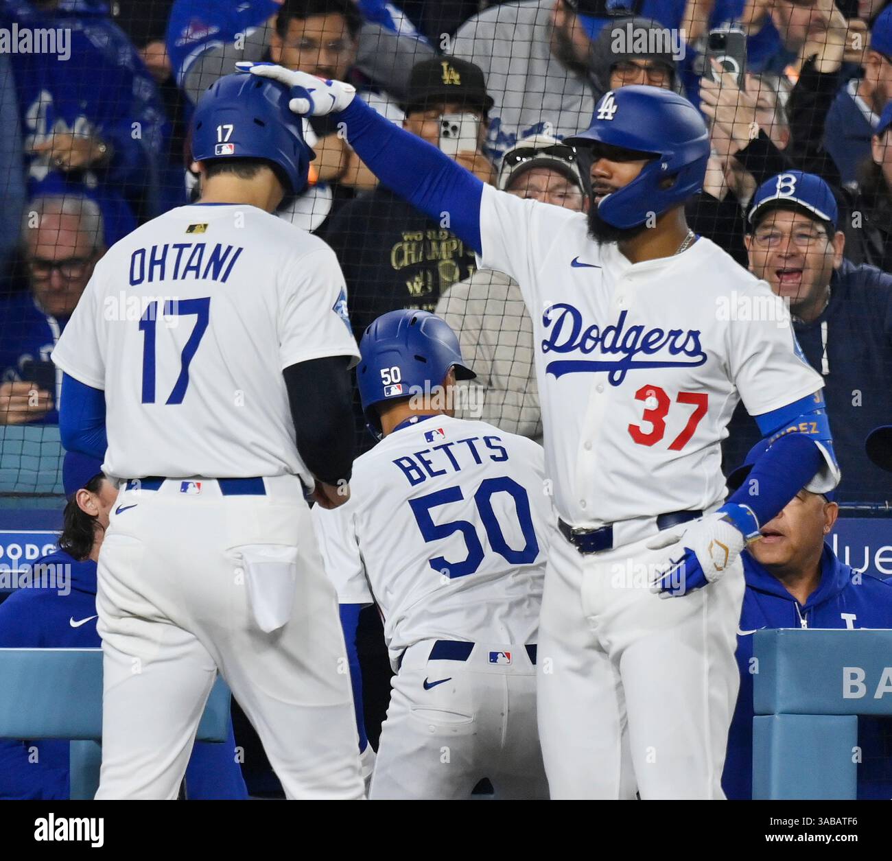 Los Angeles Dodgers shortstop Mookie Betts (50) celebrates with Teoscar ...