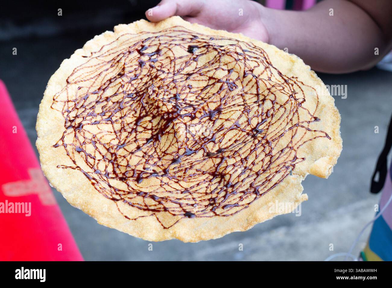 Kabkab, a traditional Filipino sweet treat made from thinly pressed ...