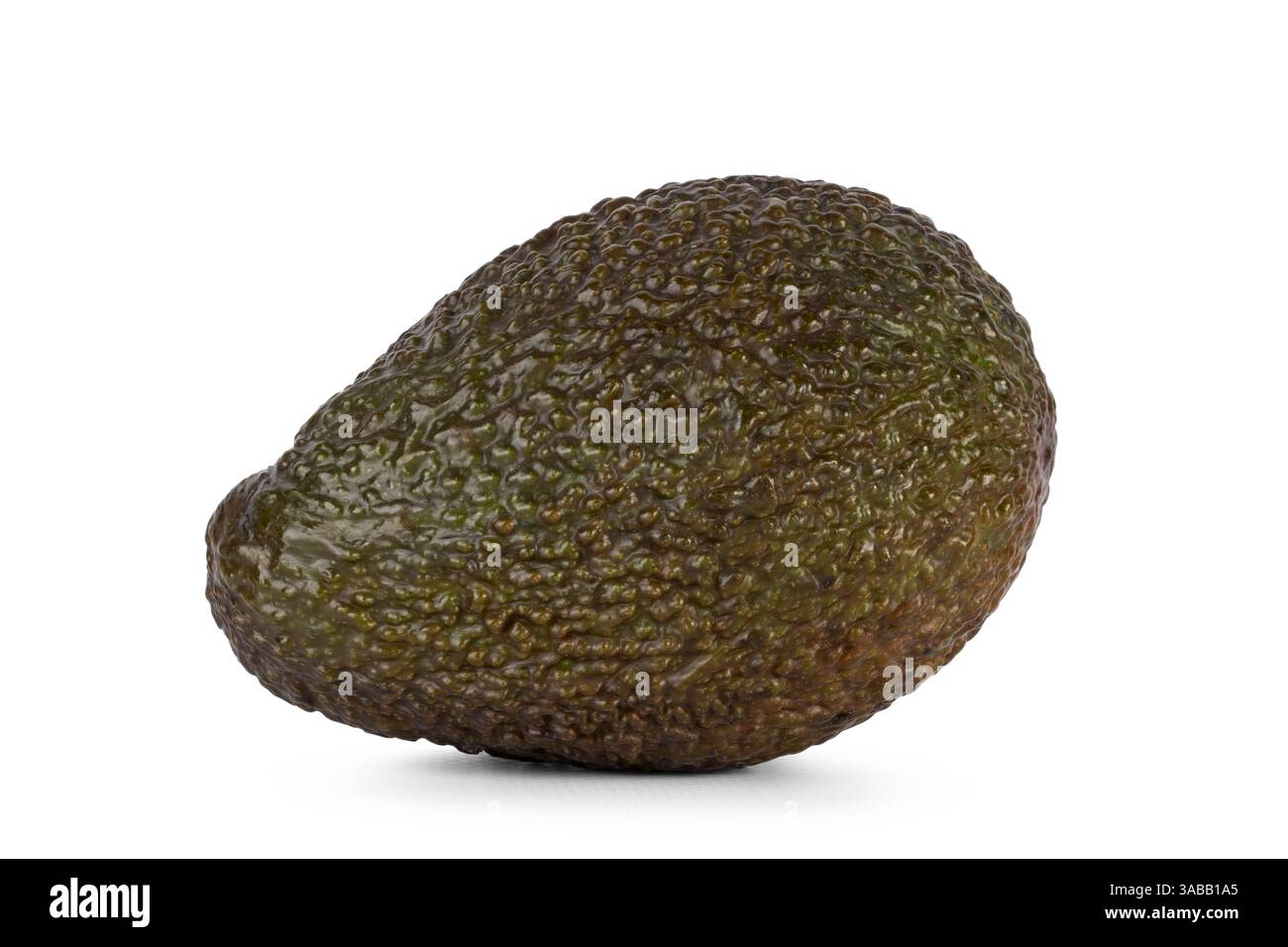 Avocado laying side ways. Isolated on a white background Stock Photo ...