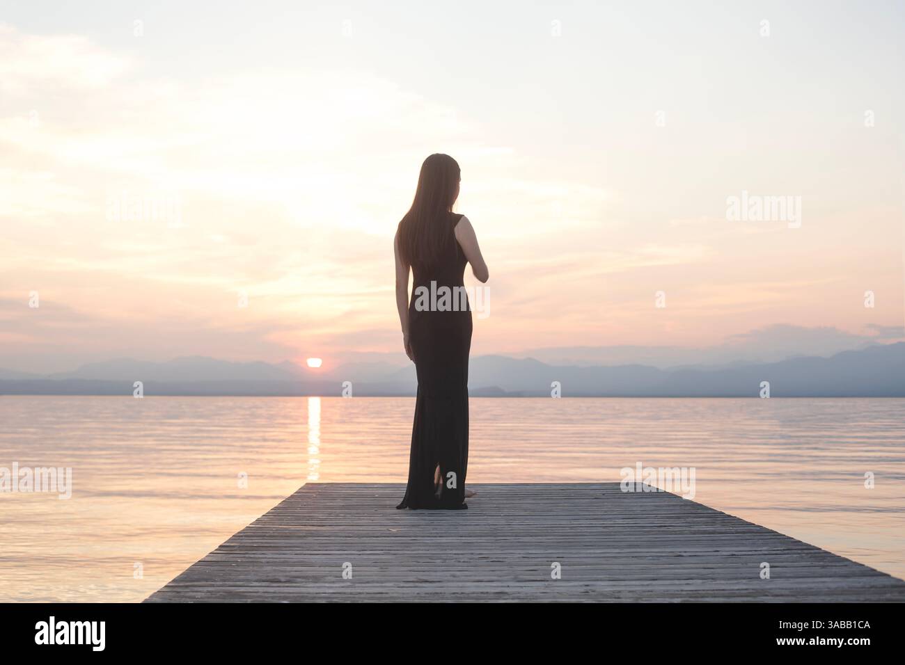Elegant woman looks infinity hi-res stock photography and images - Alamy