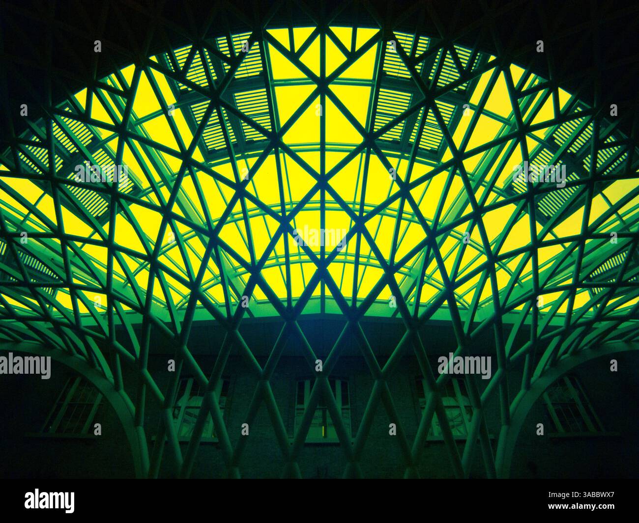 Detail of white steel lattice roof in London's King's Cross railway ...