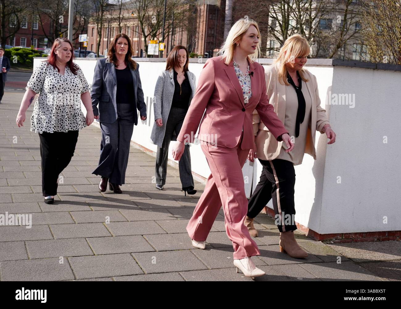Bethany Hutchison (front left) and Lisa Lockey (front right) lead a ...
