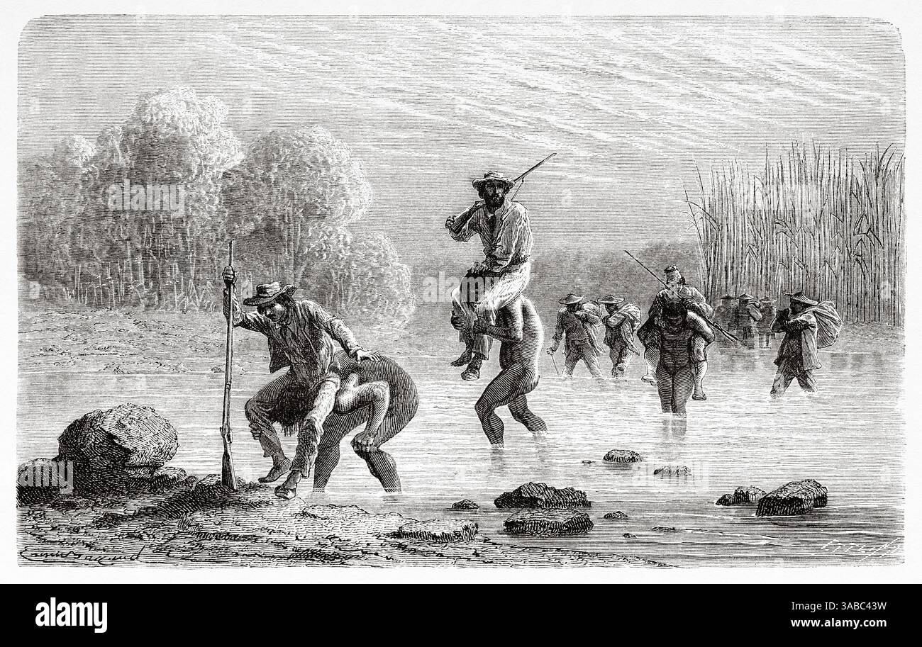 Explorers carried by indigenous across the river, Peru. South America ...