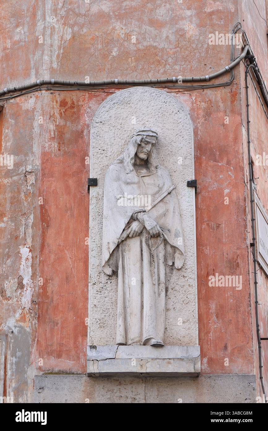 Sculpted tablet depicting St. Francis on a building wall in Rome ...