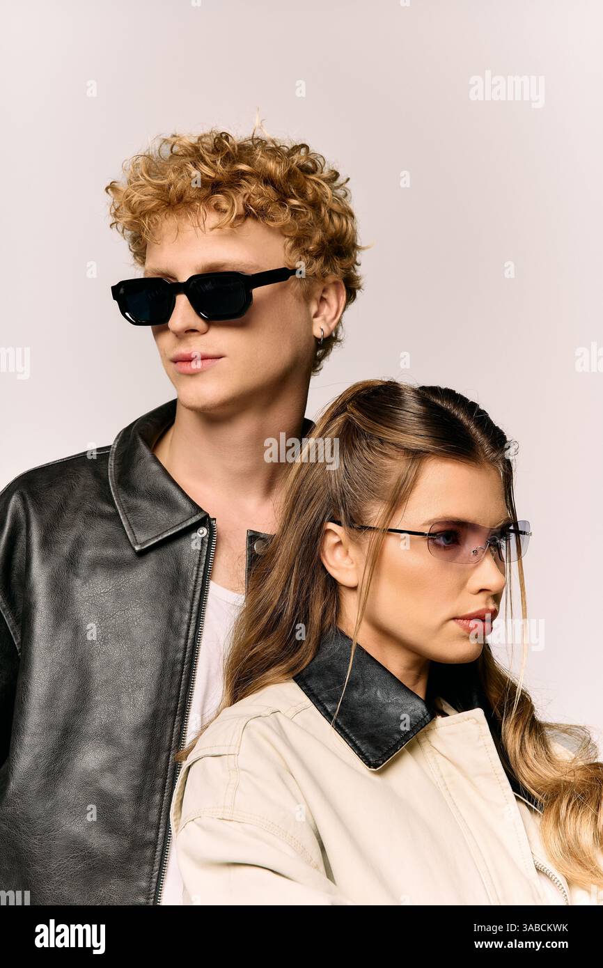 Confident couple showcases vibrant fashion and deep connection ...