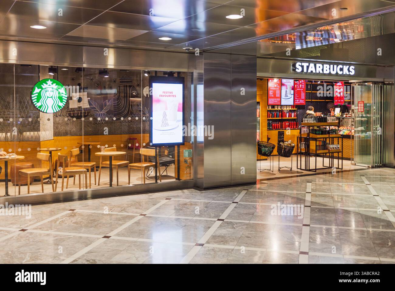 Starbucks coffee shop interior with branded logo and customer area ...