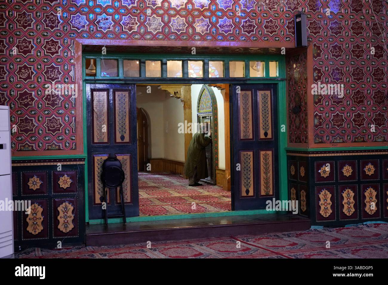 A Kashmiri Muslim man prays inside the shrine of Sheikh Abdul Qadir ...