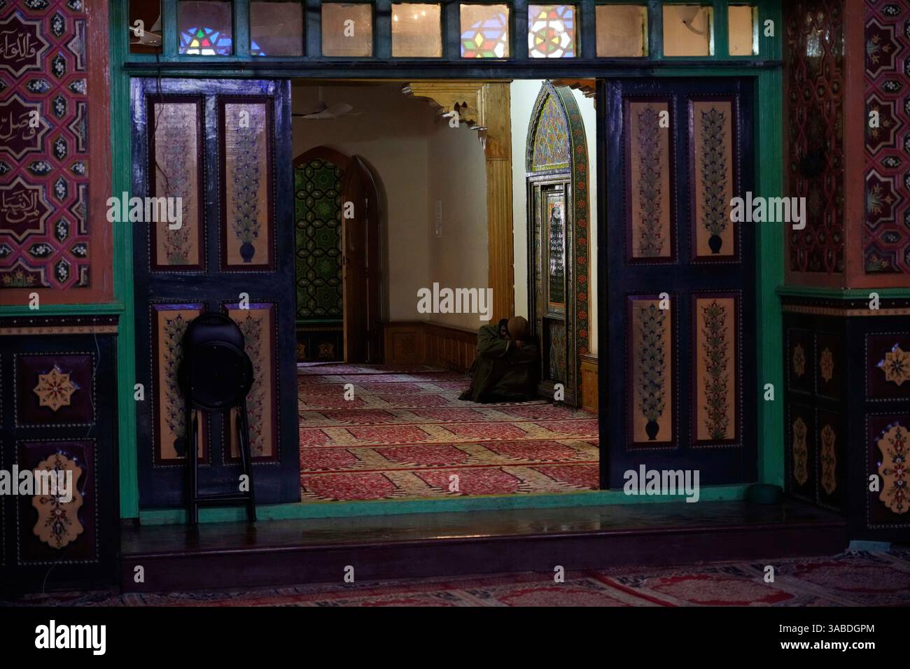A Kashmiri Muslim man prays inside the shrine of Sheikh Abdul Qadir ...