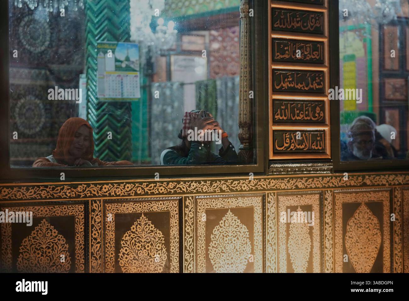 Kashmiri Muslims pray inside the shrine of Sheikh Abdul Qadir Jeelani ...