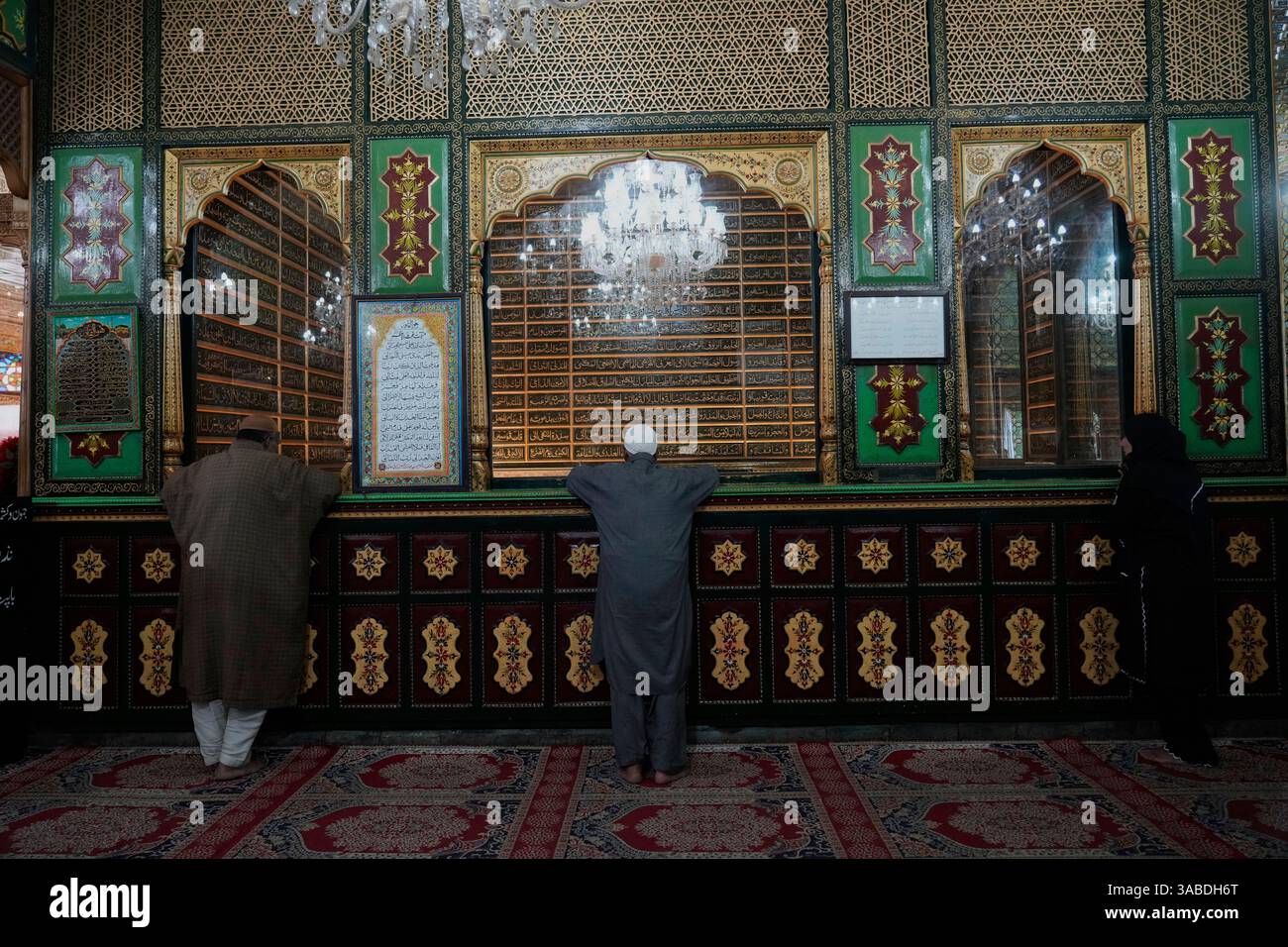 Kashmiri Muslims pray inside the shrine of Sheikh Abdul Qadir Jeelani ...