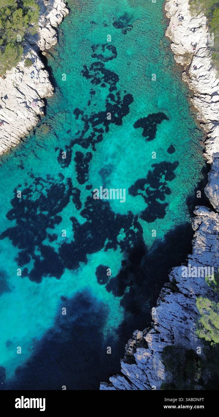 Aerial view of Port-Pin Cove, a hidden rocky inlet with turquoise water ...