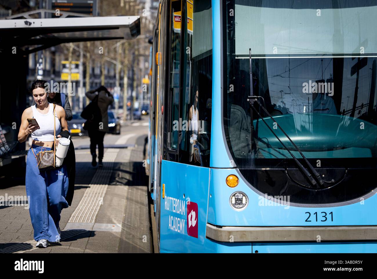 ROTTERDAM - A streetcar stands still on the Schiedamsedijk during a ...