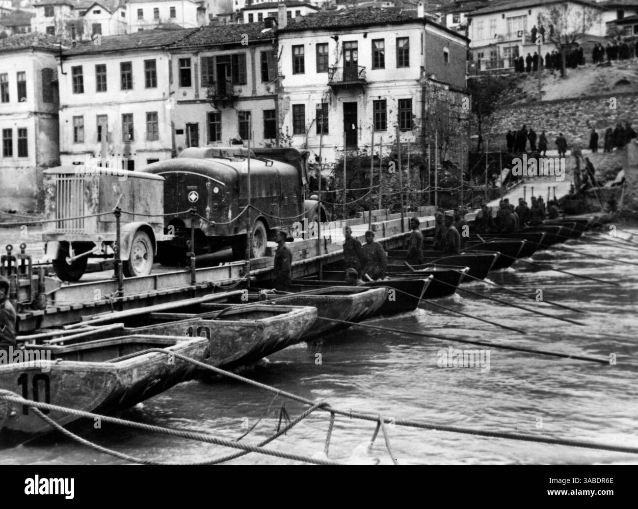 German troops advancing across a pontoon bridge over the Vardar in ...