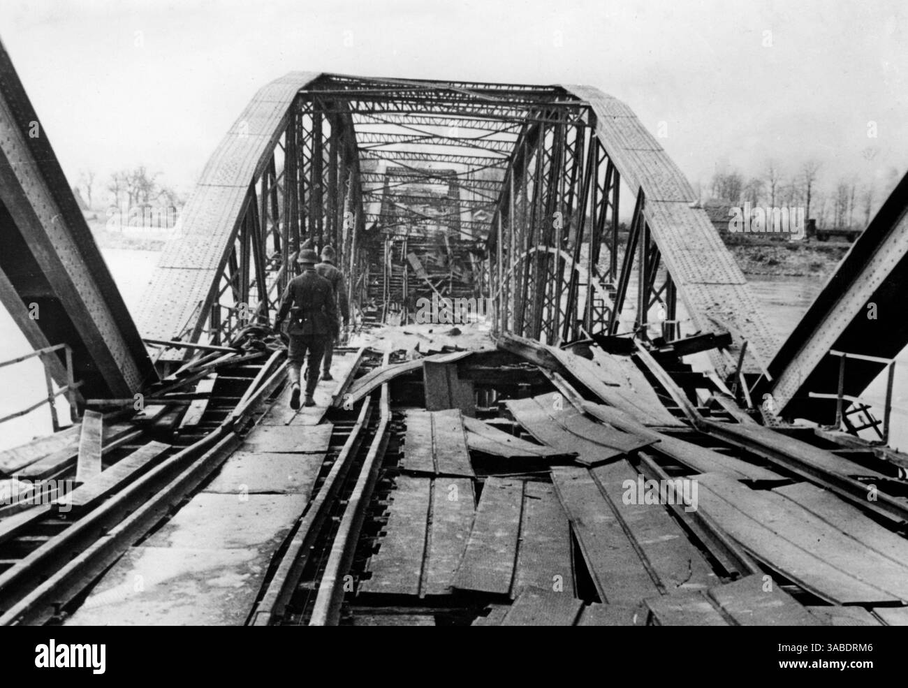 German soldiers on the blown-up railroad bridge over the Drava at the ...