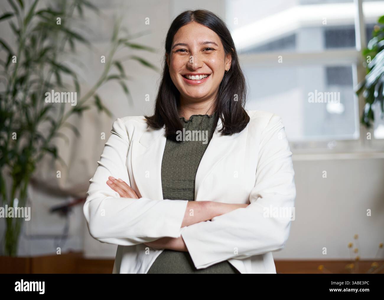 Confident Professional Woman Smiling in an Office with a Positive and ...