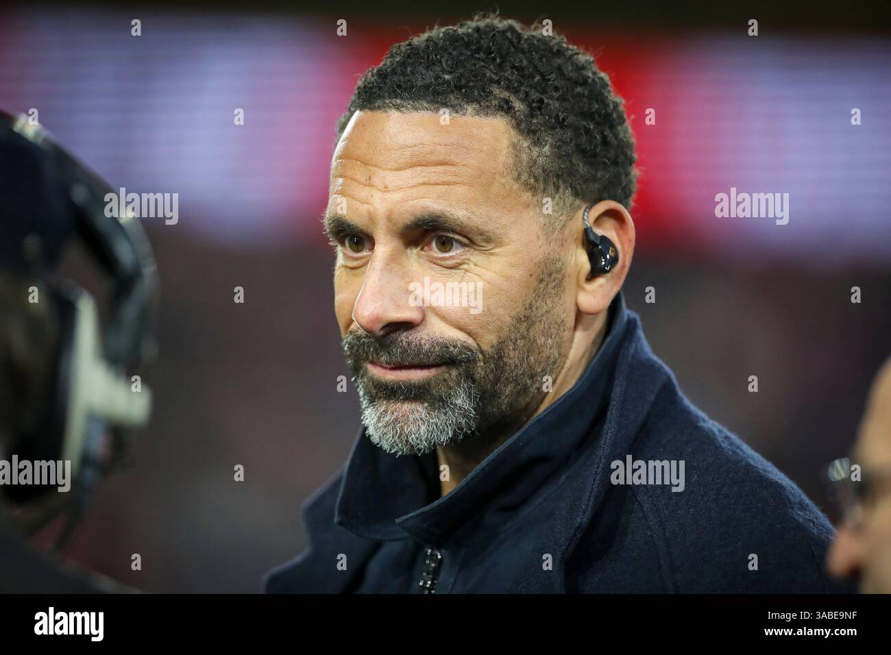 Nottingham, UK. 01st Apr, 2025. Rio Ferdinand smiles TV TNT presenter ...