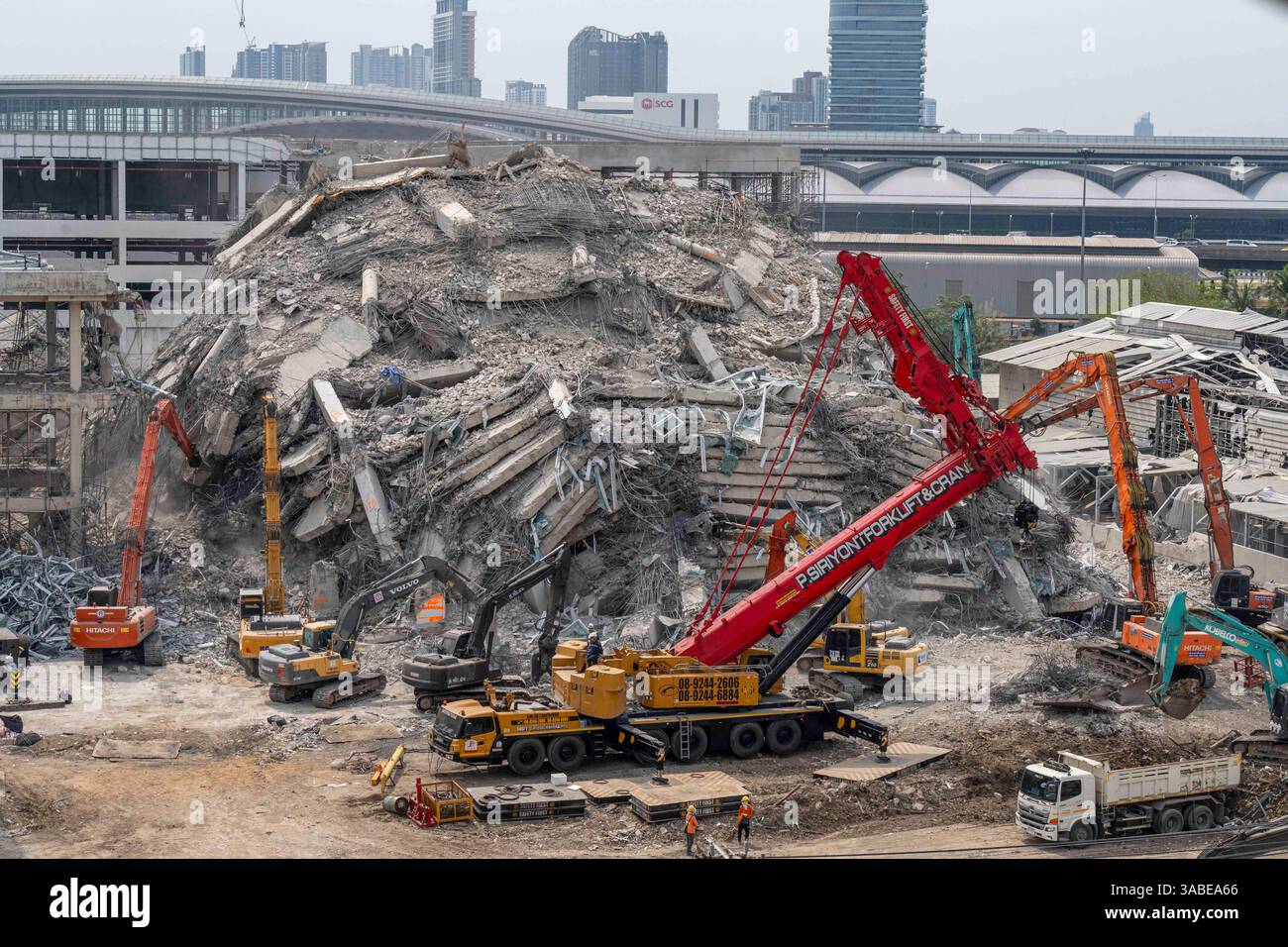 April 2, 2025, Bangkok, Bangkok, Thailand: Heavy machinery is used to ...