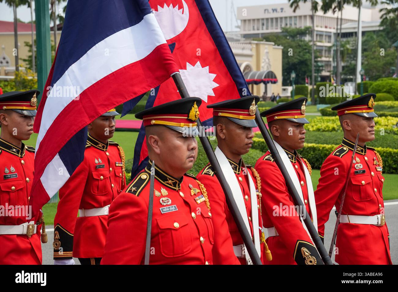 Thai Royal Guards seen holding the Thai and Nepalese flags at the Honor ...
