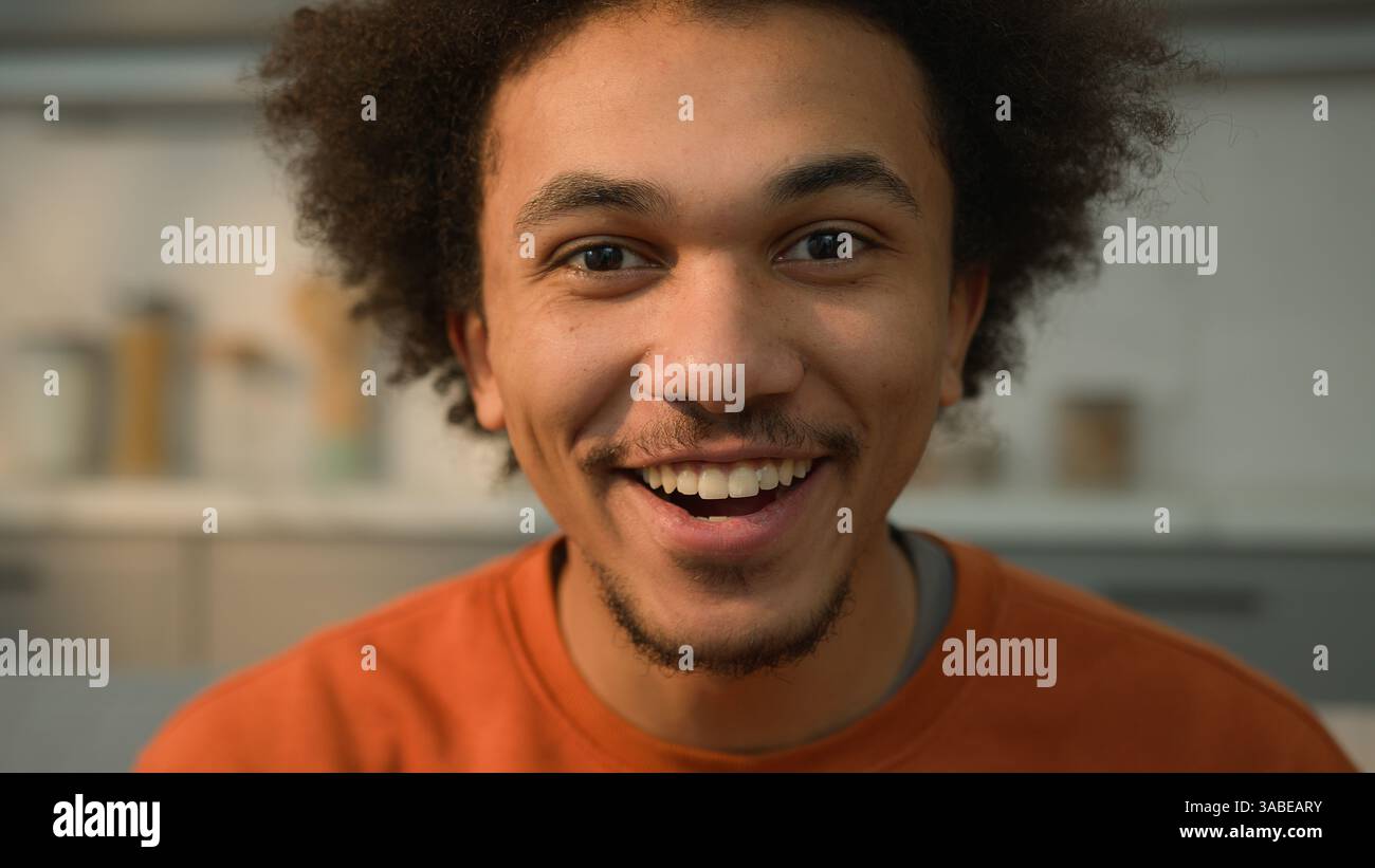 Close up happy excited African American man wonder male face surprised ...