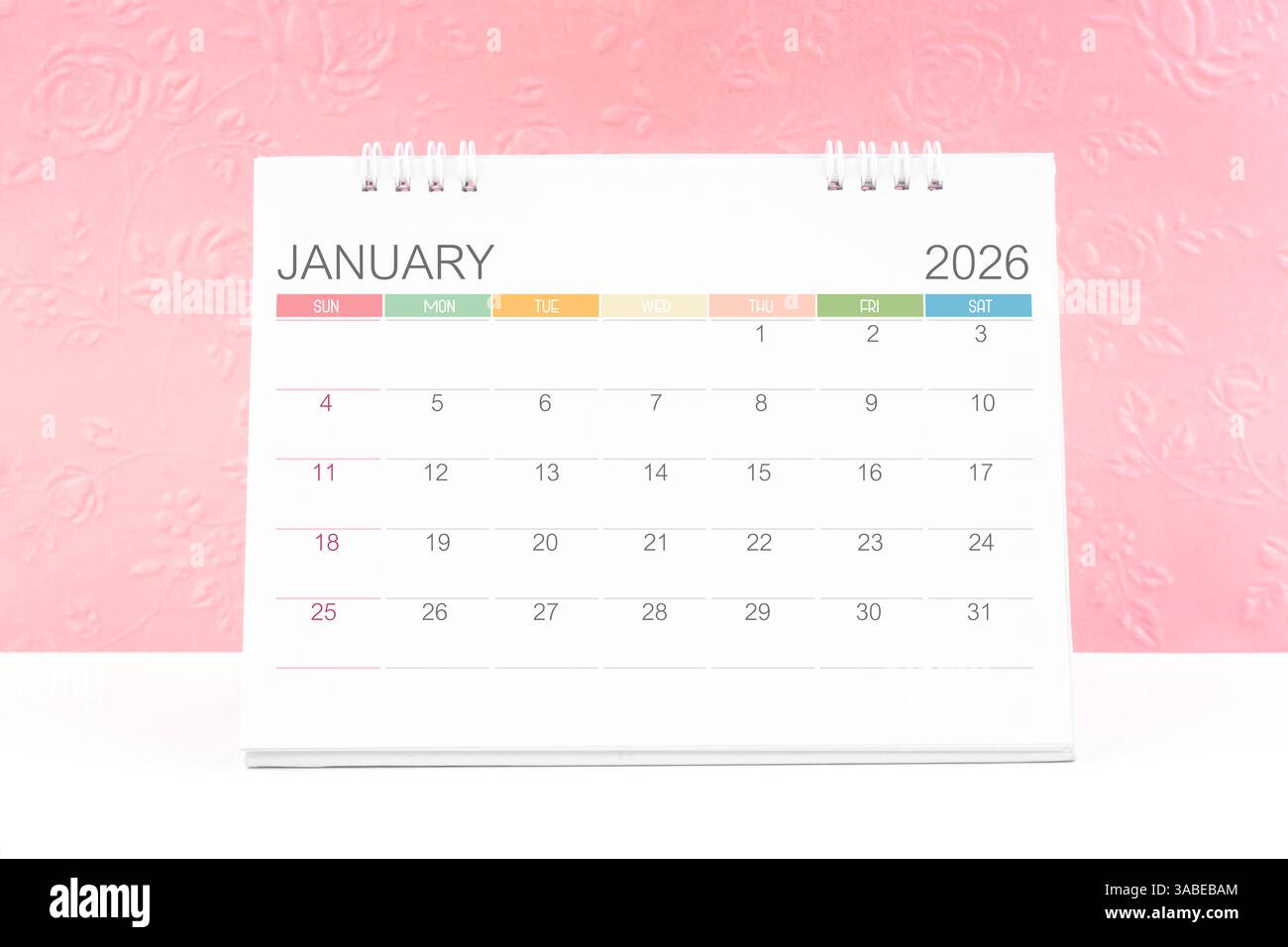 January 2026, Desk calendar with pink color flower pattern embossed as ...