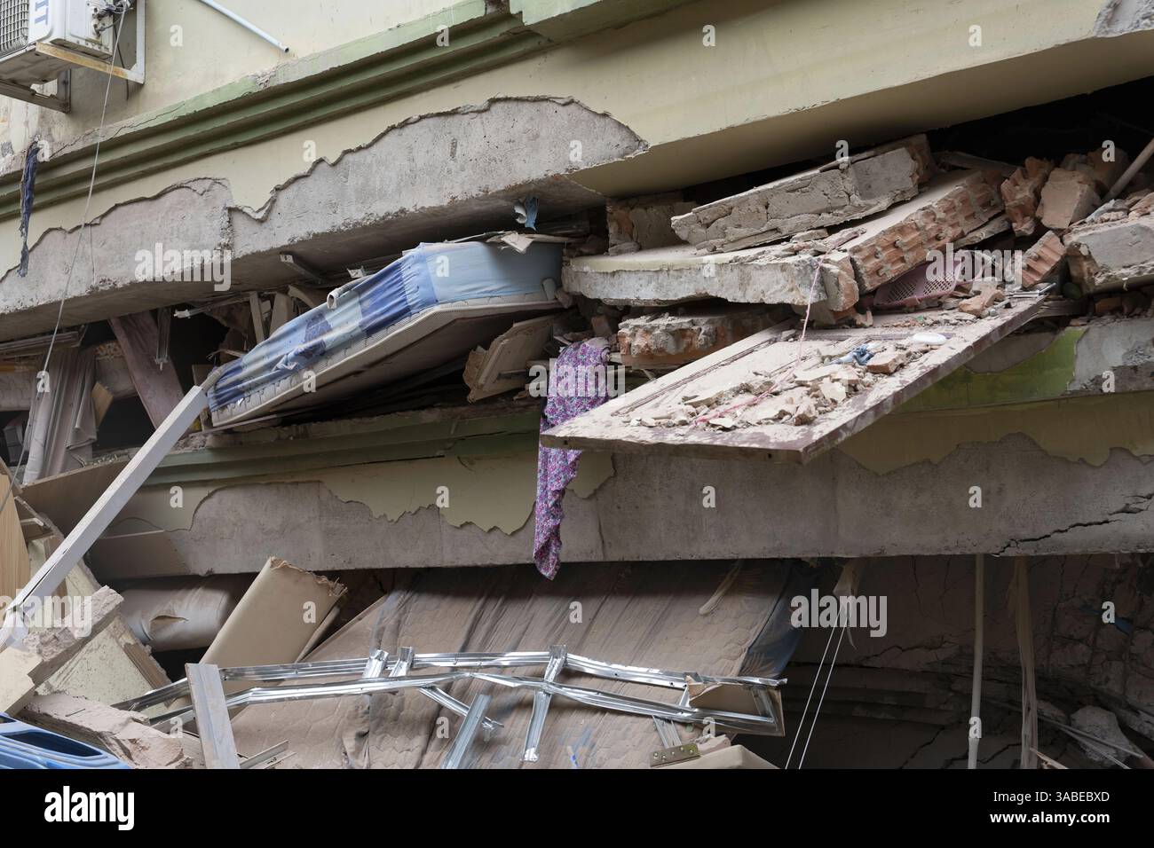 Mandalay, Myanmar. 01st Apr, 2025. This photo shows the collapsed home ...