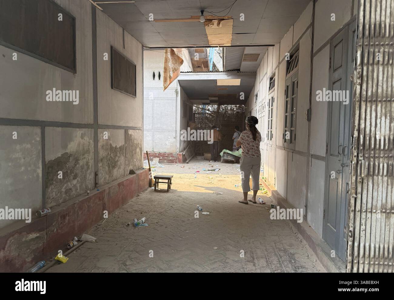 Mandalay, Myanmar. 01st Apr, 2025. Mother of Shin Shin prays in ...