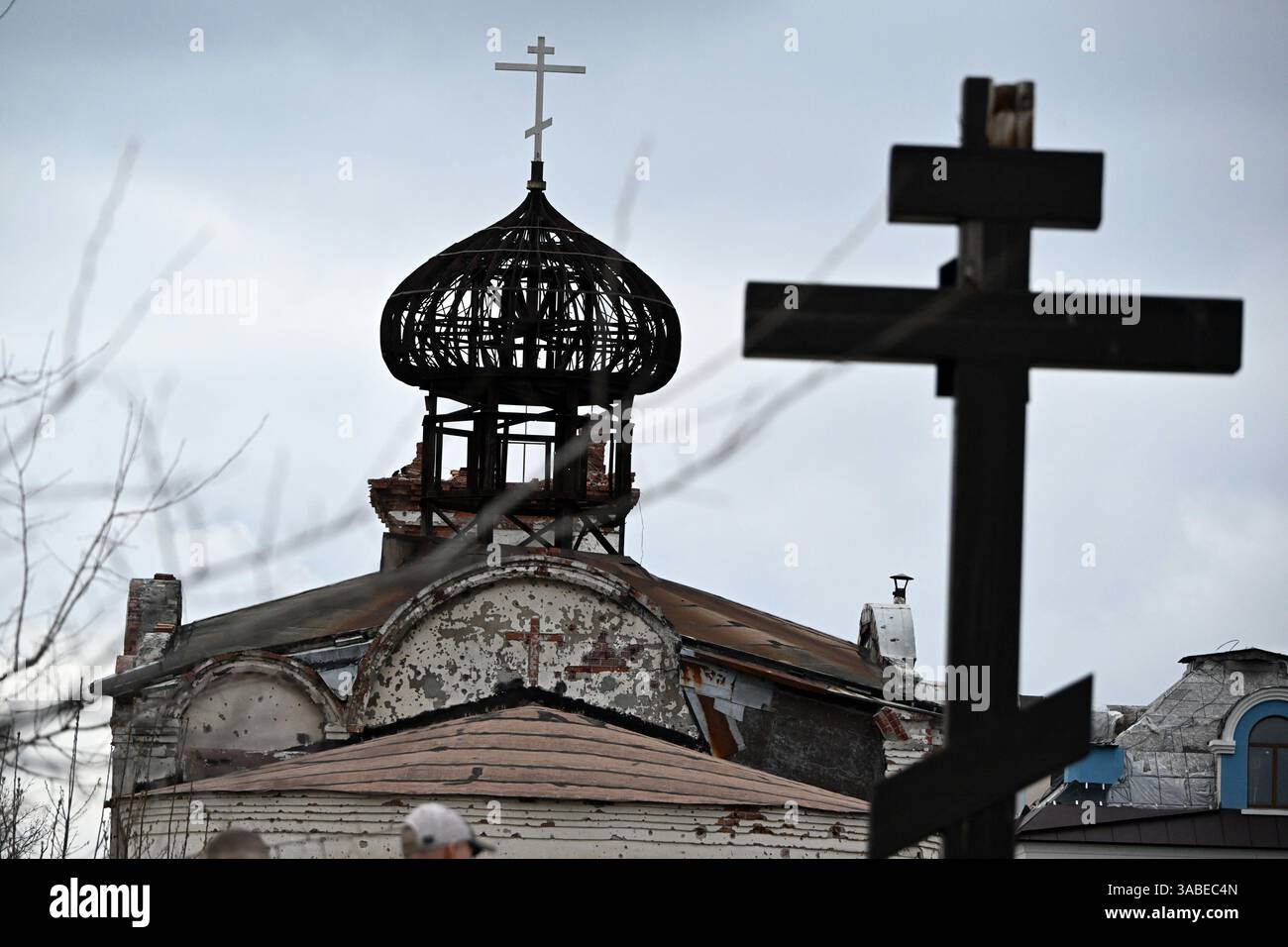 The dome of the Donetsk Monastery church damaged by shelling. Credit ...