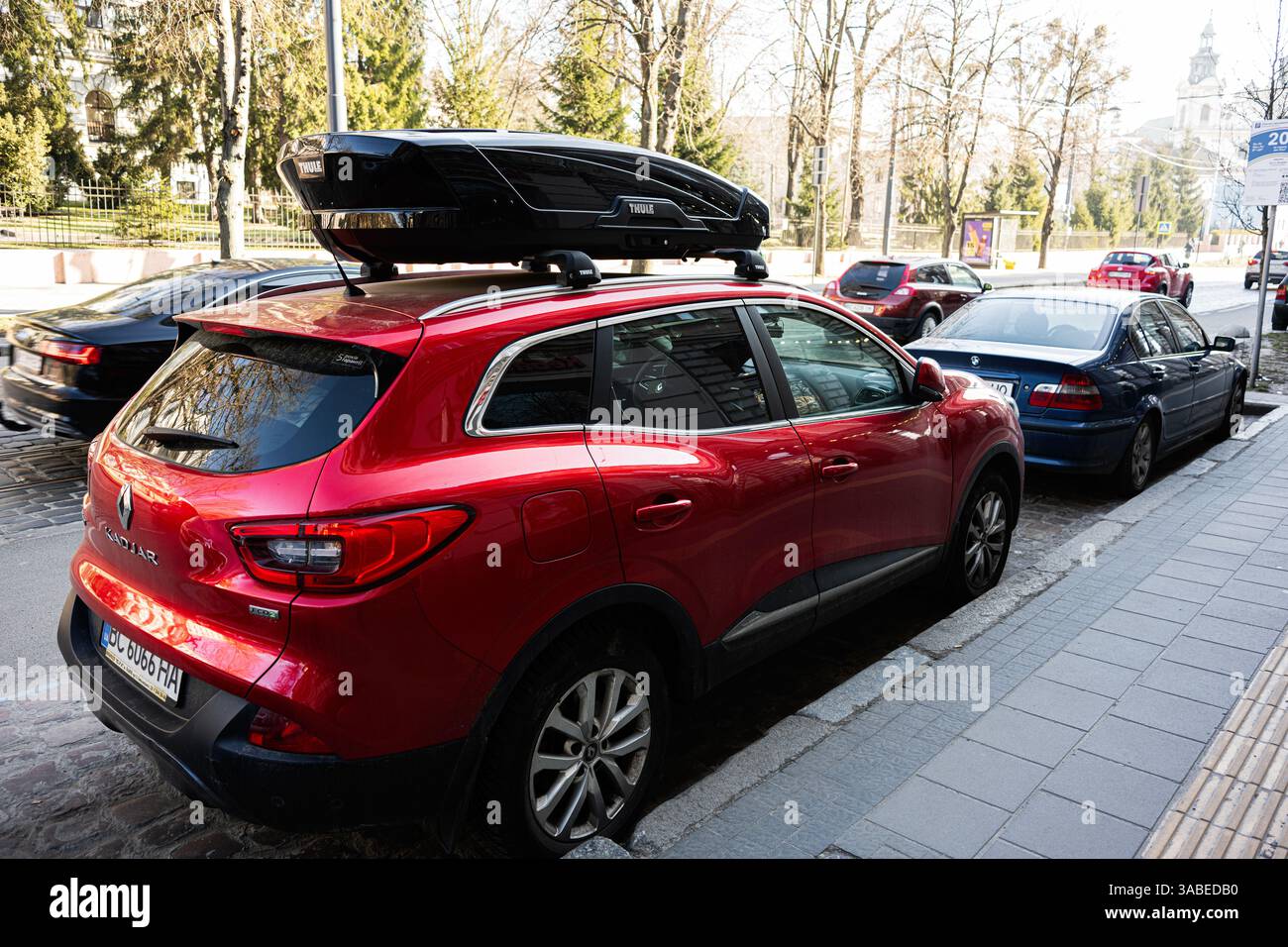 Lviv, Ukraine - April 01, 2025: Bright red Renault Kadjar car equipped ...