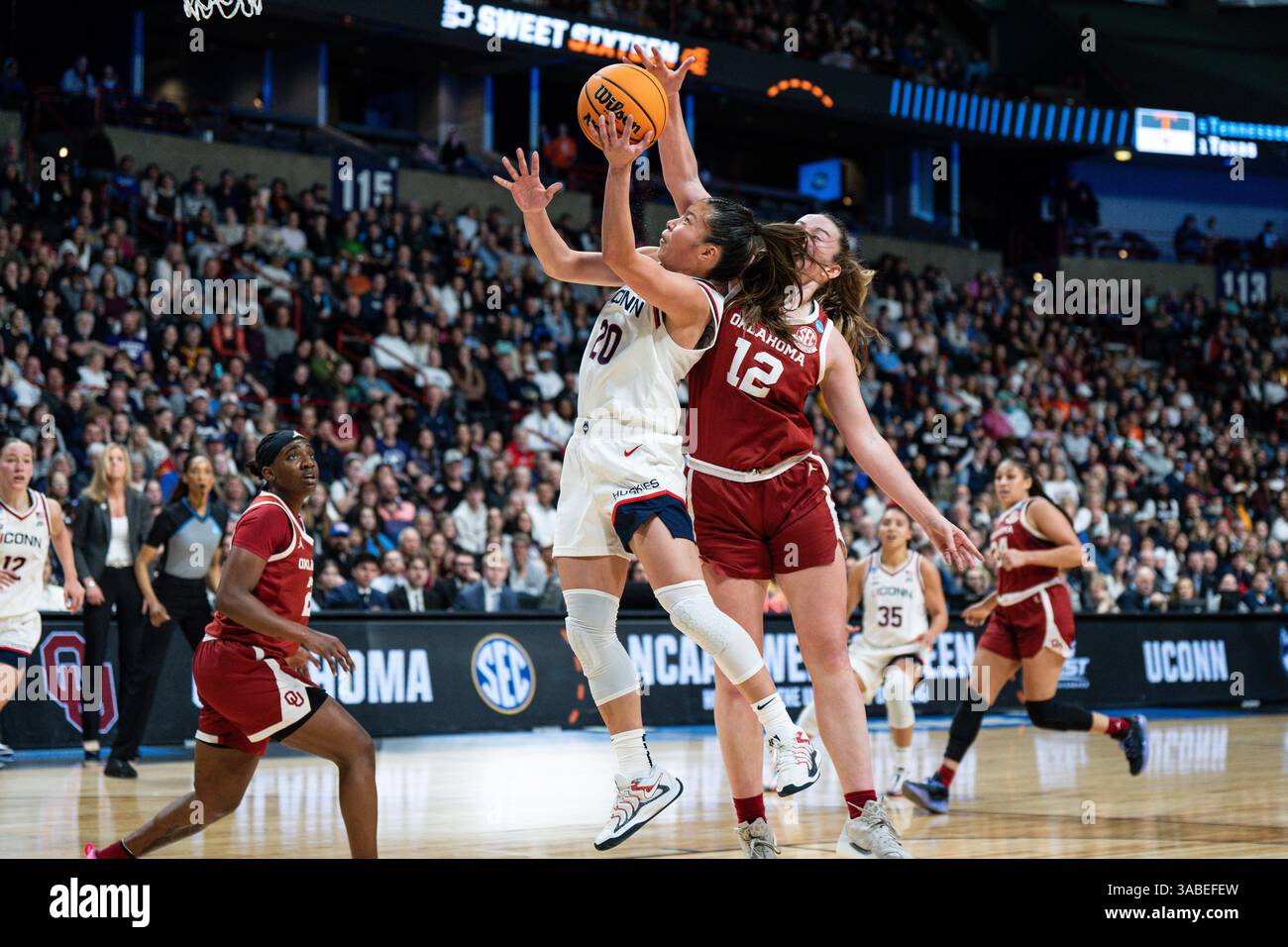 Oklahoma Sooners guard Payton Verhulst (12) blocks a shot by UConn ...