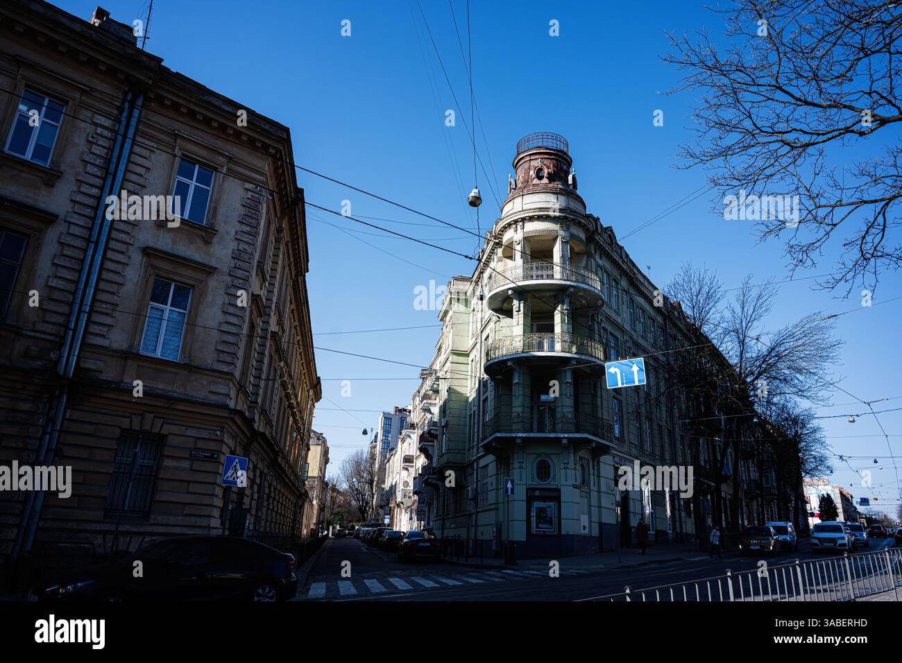 Lviv, Ukraine - April 01, 2025: A historic building with blue sky in ...