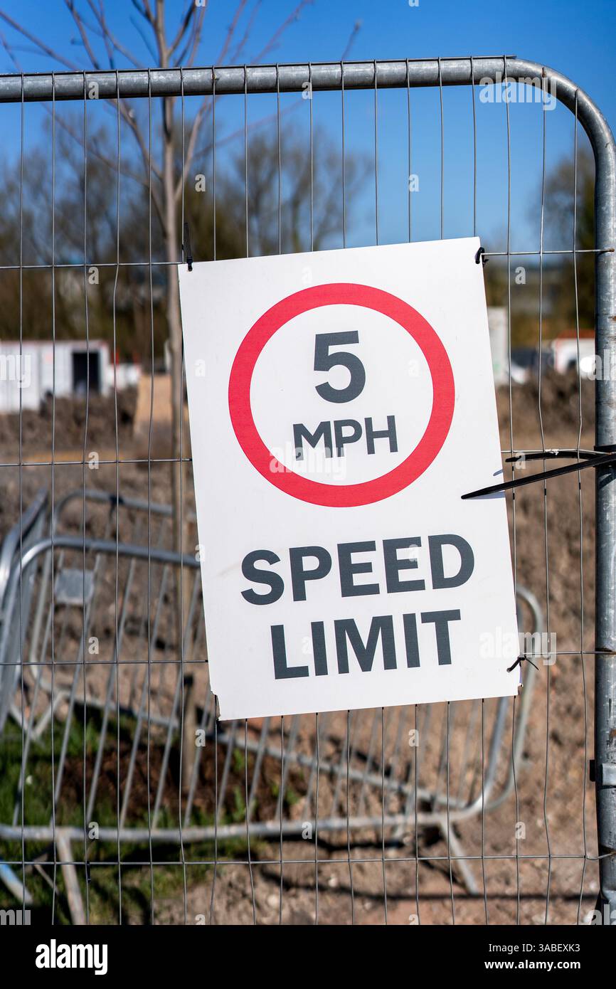 5 mph speed limit sign on metal fence Stock Photo - Alamy