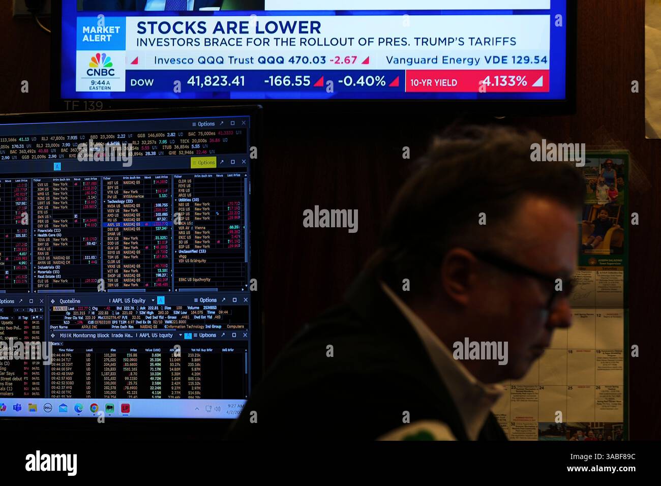 Traders work on the floor at the New York Stock Exchange in New York ...