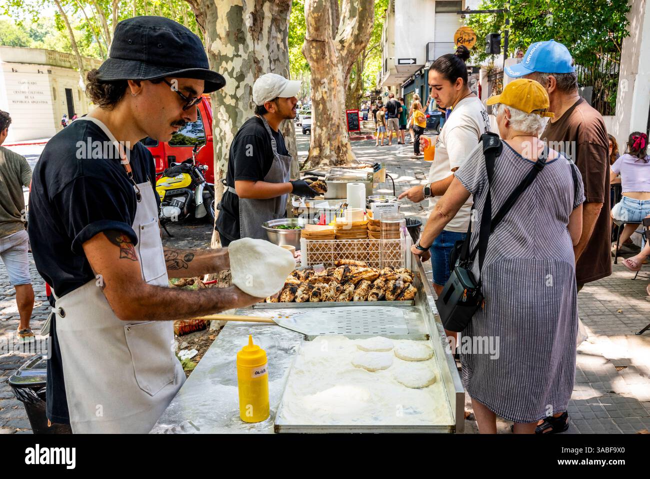 People Buying Street Food In The City Of Colonia del Sacramento ...