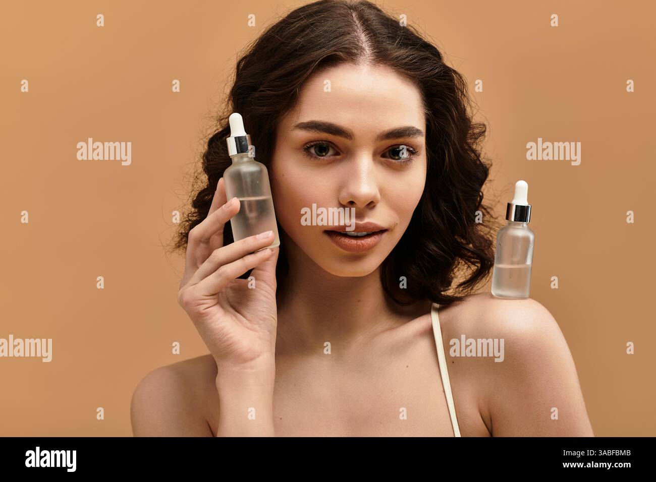 Pretty young woman with braces demonstrates her beauty skincare routine ...