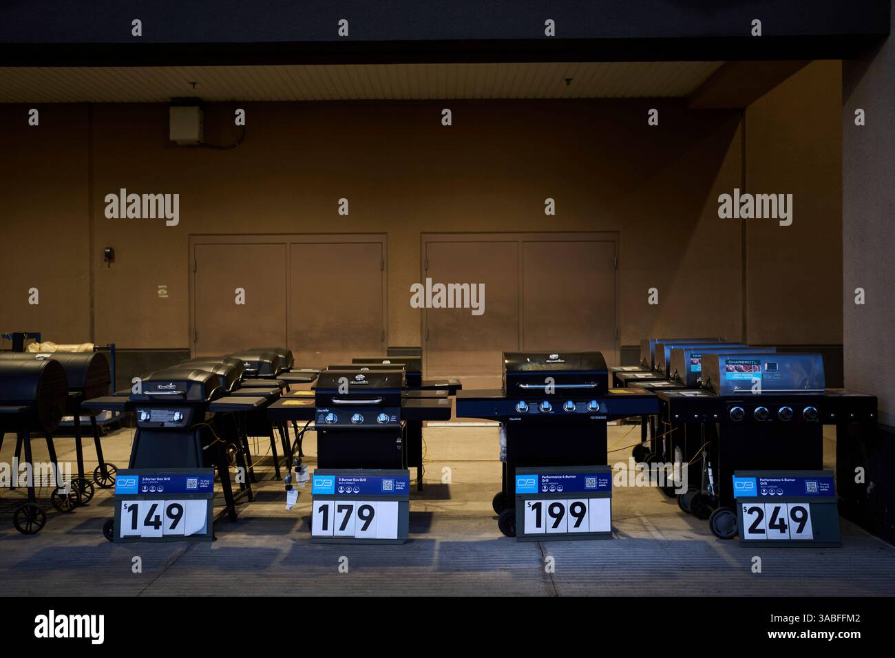 Grills for sale are seen outside a Lowe's store in La Habra, Calif ...