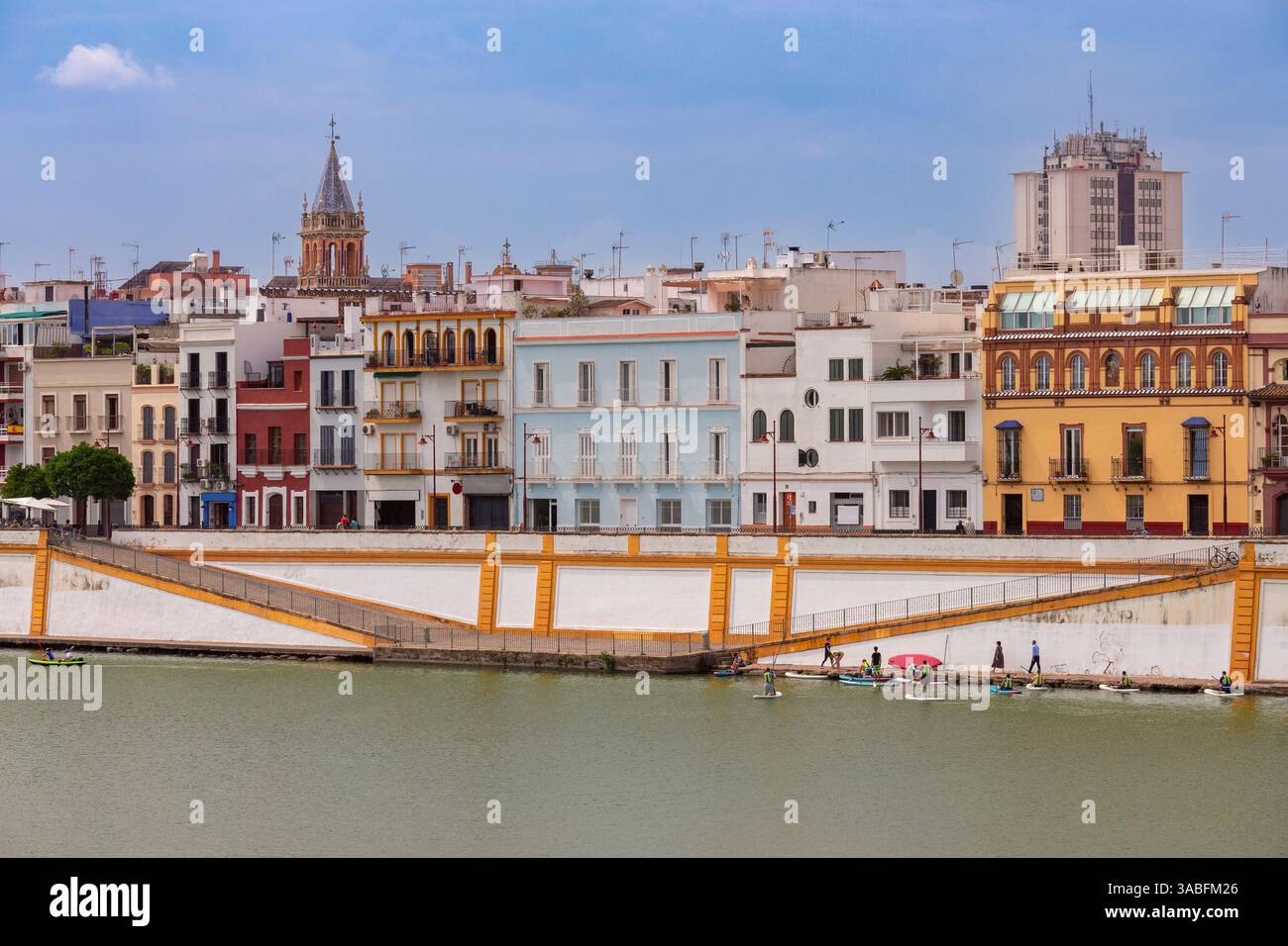 Colorful riverside houses in Seville Spain Stock Photo - Alamy