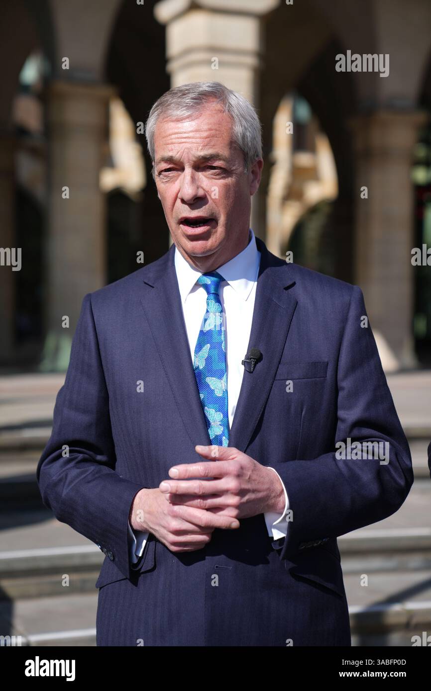 Reform UK leader Nigel Farage speaking outside the Northampton ...