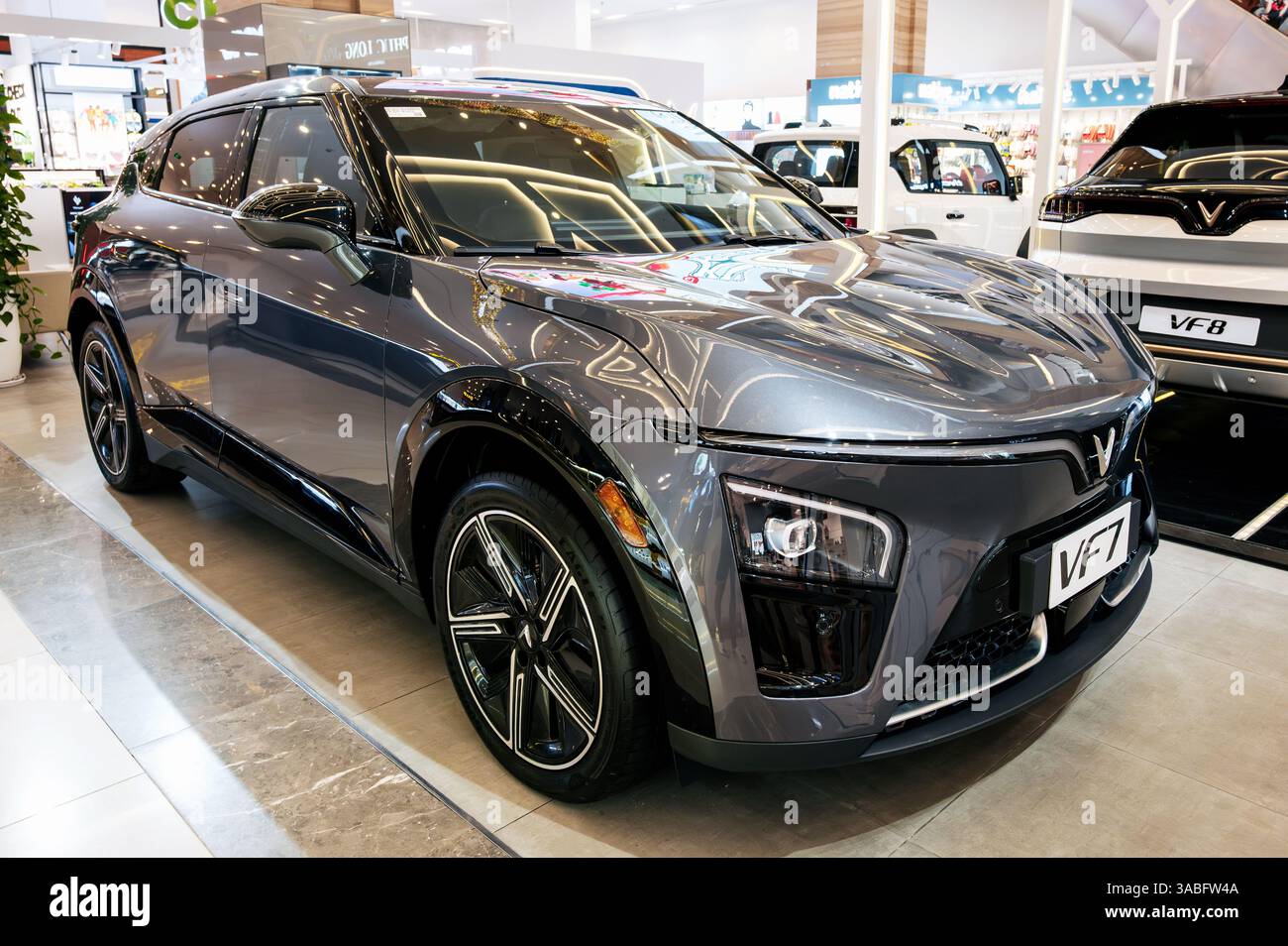Modern Vietnamese electric car Vinfast VF7 at the automobile exhibition ...