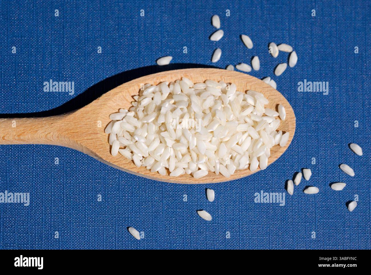 Raw white rice wooden hi-res stock photography and images - Alamy
