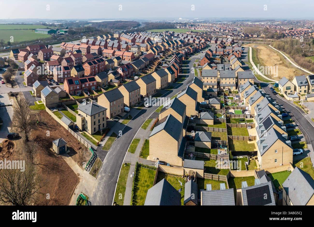 Aerial panorama landscape view of a large new build housing development ...